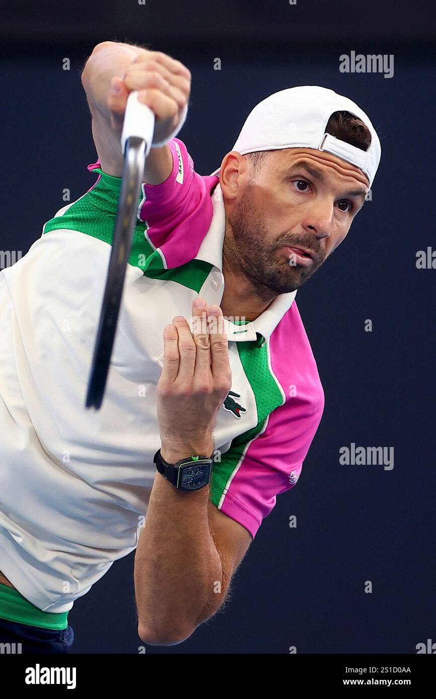 Bulgaria's Grigor Dimitrov serves against Australia's Jordan Thompson ...