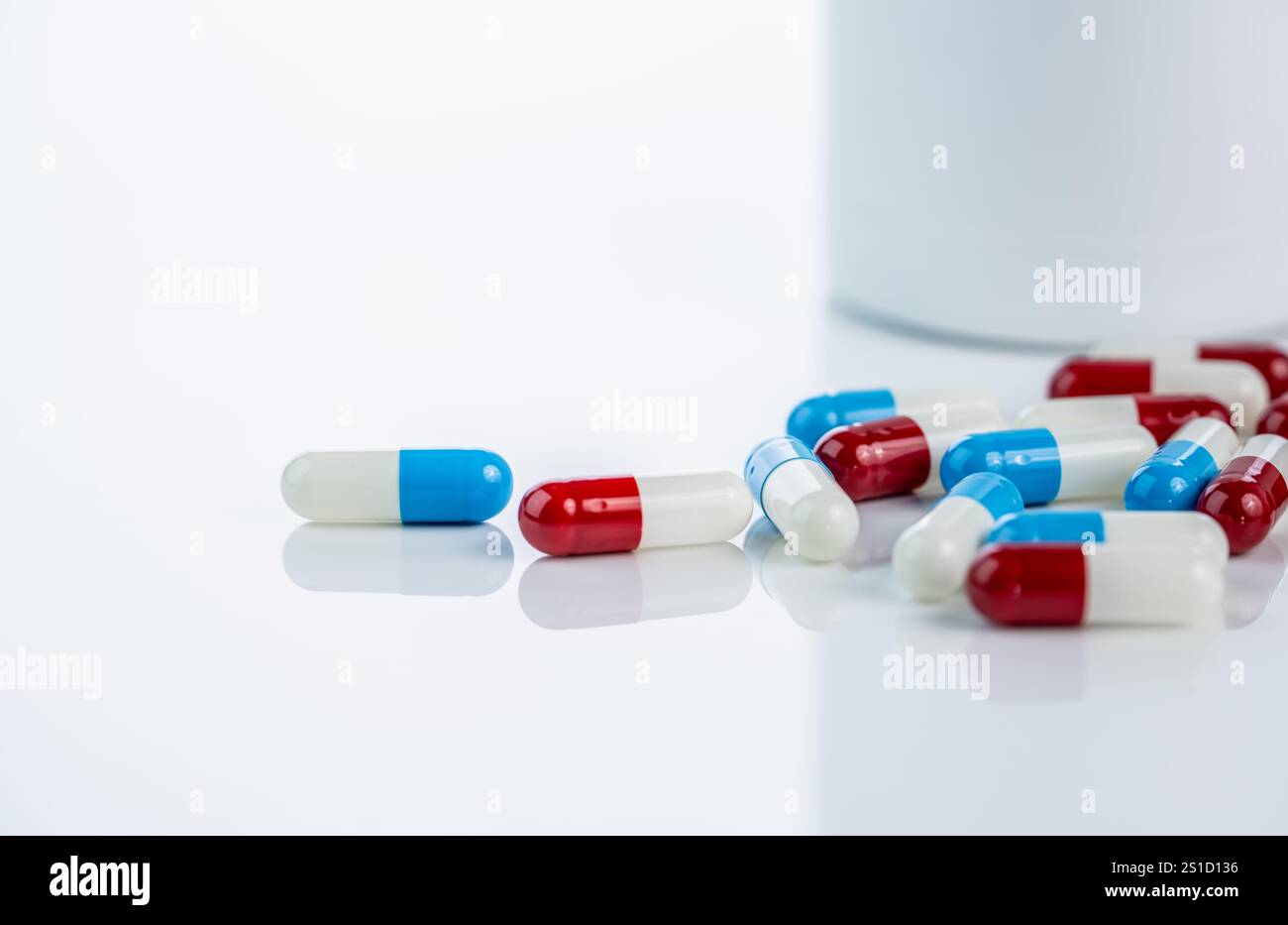 Red white and blue white capsules pill illustrate dual use of ...
