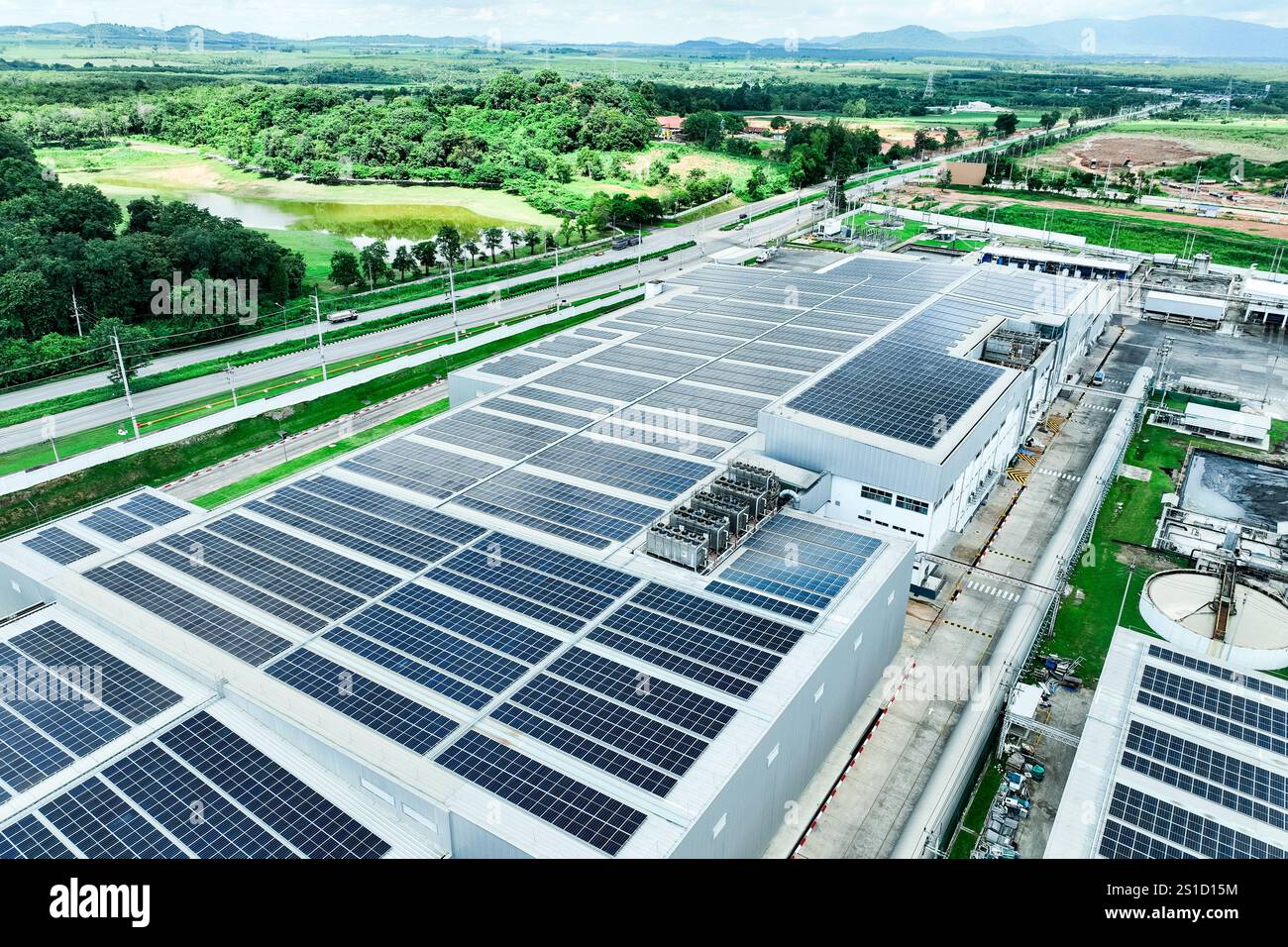 Solar energy for factory and warehouse building. Solar panels on roof ...