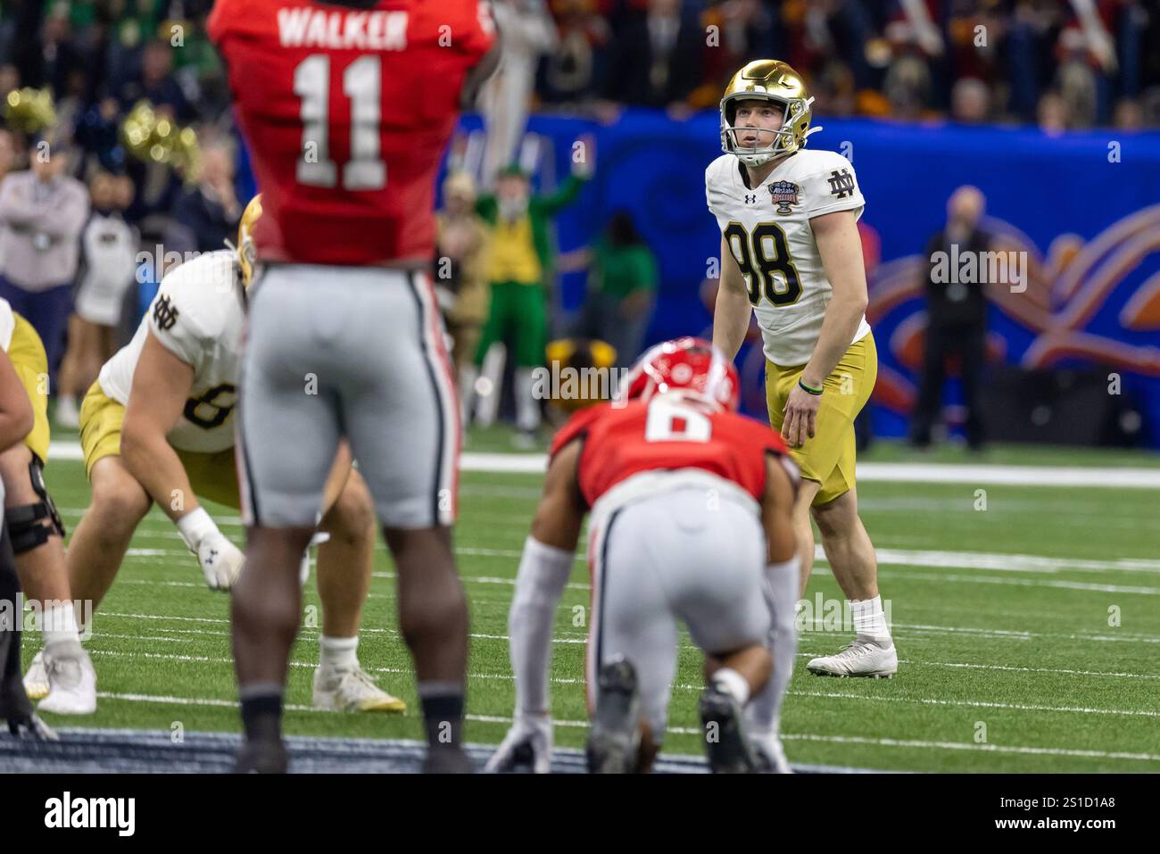 Notre Dame Fighting Irish place kicker Mitch Jeter (98) prepares to ...