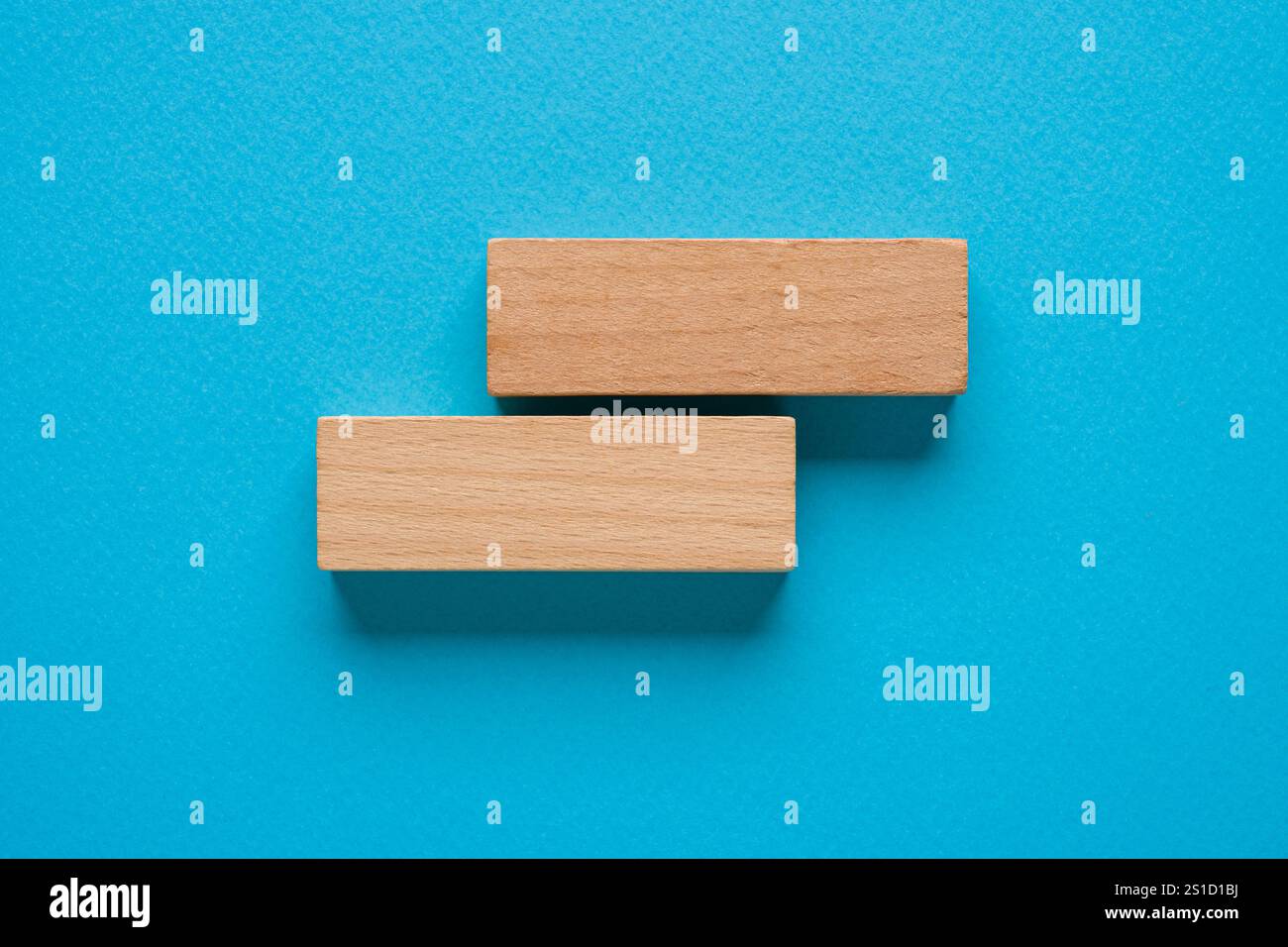 Blank wooden blocks on a blue background that can be written on Stock ...