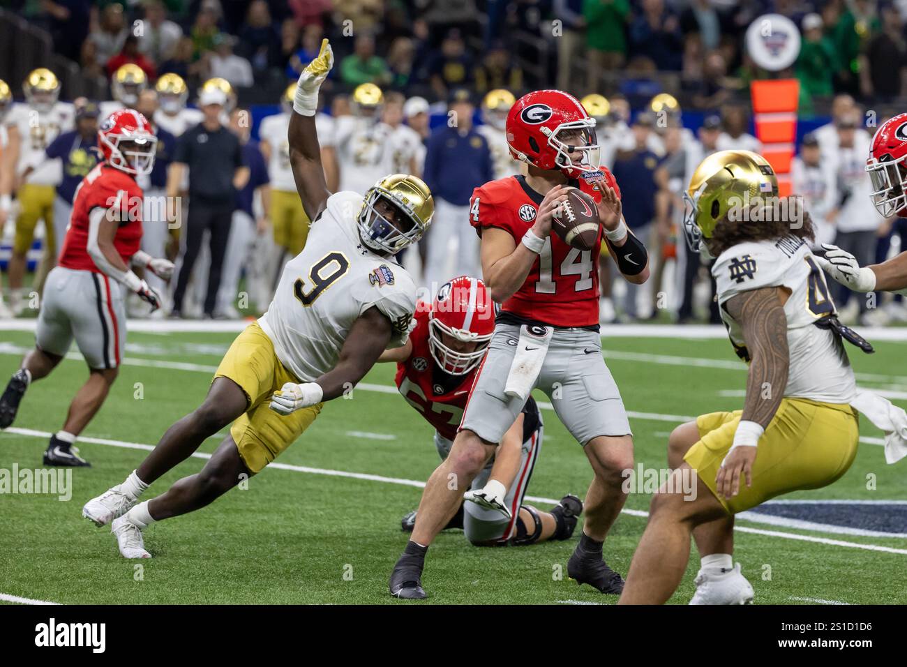 Notre Dame Fighting Irish defensive lineman RJ Oben (9) turns the ...