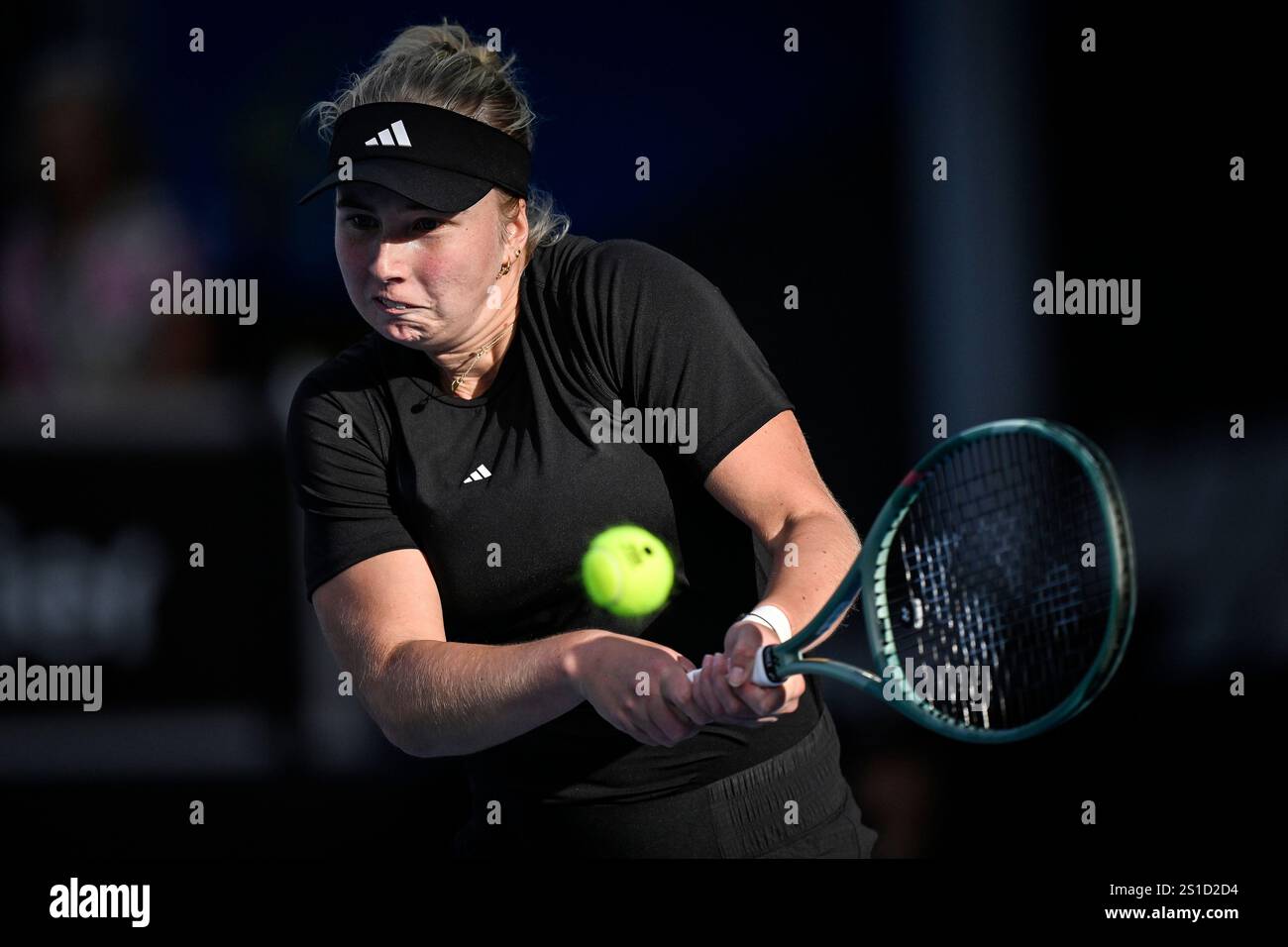 Clara Tauson of Denmark plays a shot against Madison Keys of the U.S ...