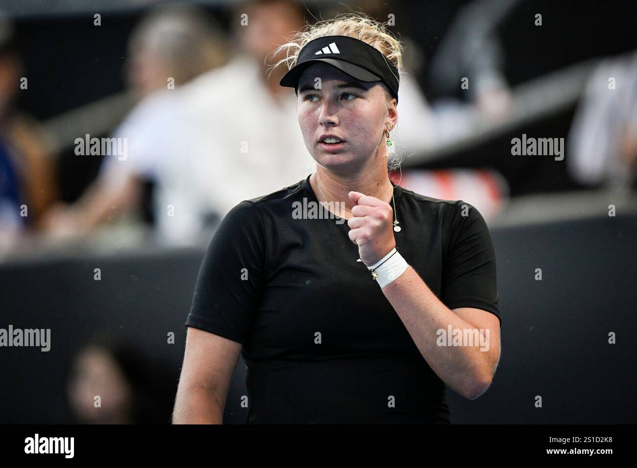 Clara Tauson of Denmark celebrates a point against Madison Keys of the ...
