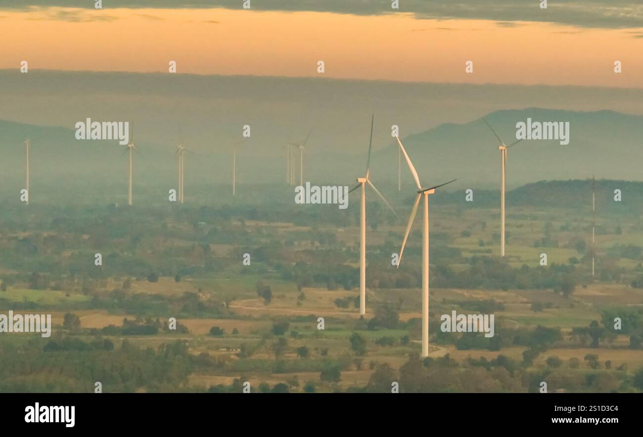 Wind farm field and sunset sky. Wind power. Sustainable, renewable ...