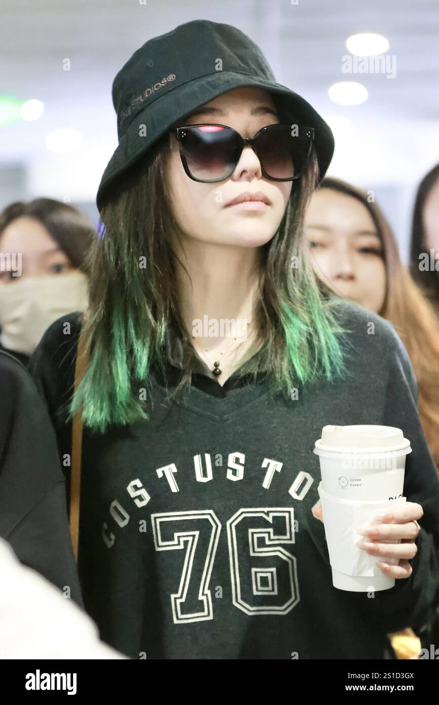 Chinese singer-songwriter Jane Zhang appears at the airport in Chengdu ...