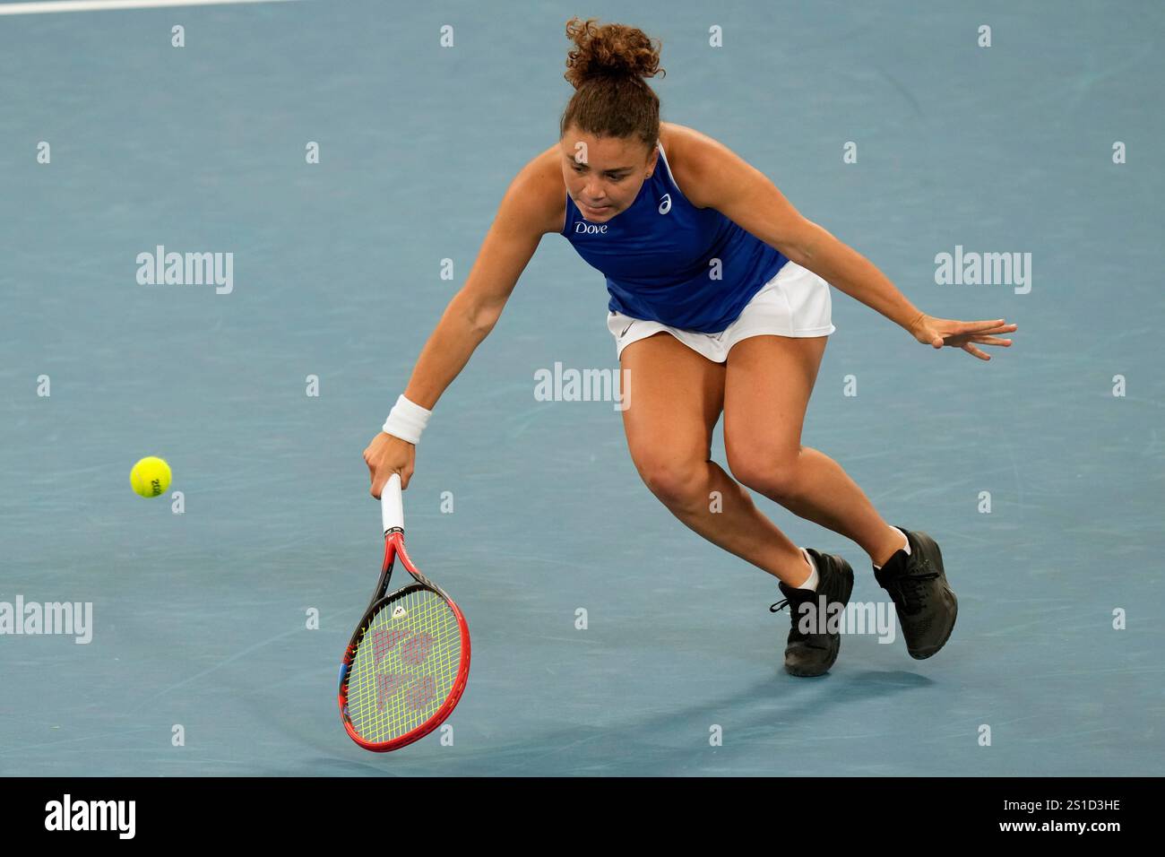 Italy's Jasmine Paolini plays a backhand to Czechia's Karolina Muchova ...