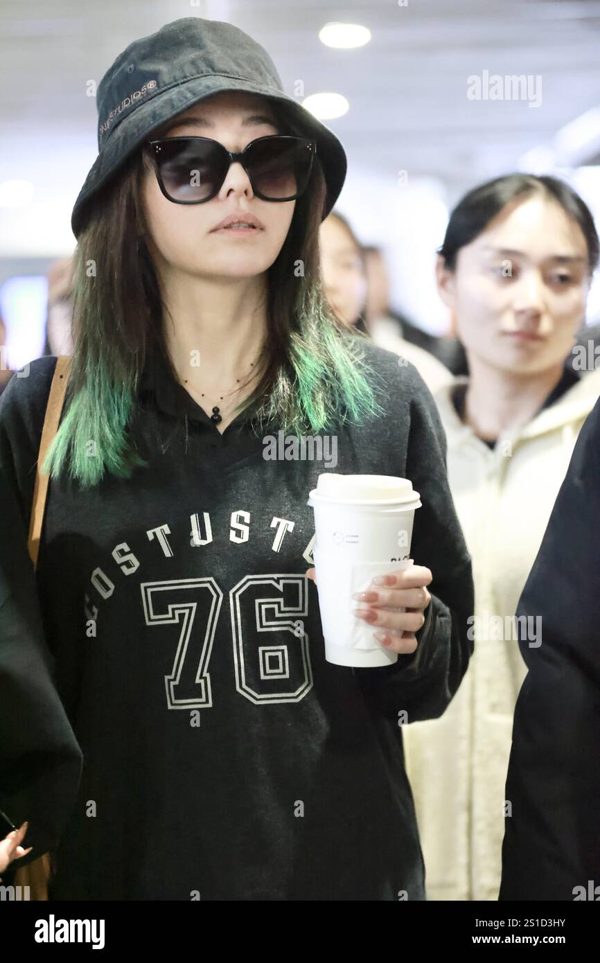 Chinese singer-songwriter Jane Zhang appears at the airport in Chengdu ...