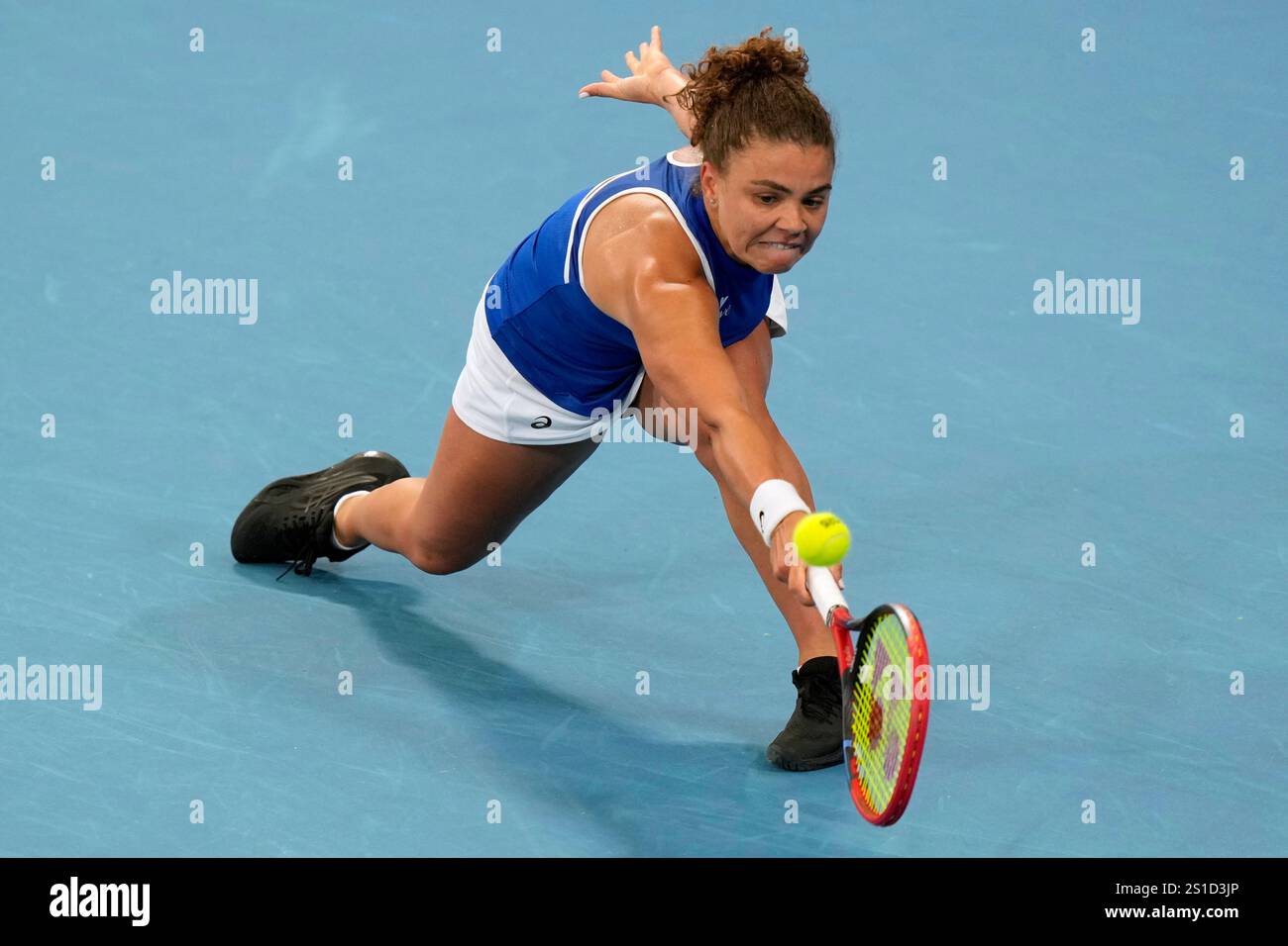 Italy's Jasmine Paolini plays a backhand to Czechia's Karolina Muchova ...