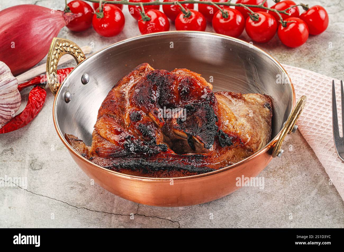 Roasted pork knuckle steak with bone Stock Photo - Alamy