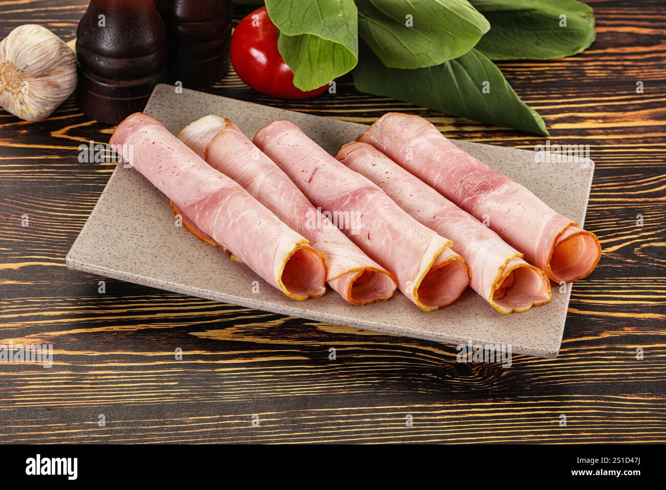Italian sausage Prosciutto cotto ham appetizer Stock Photo - Alamy