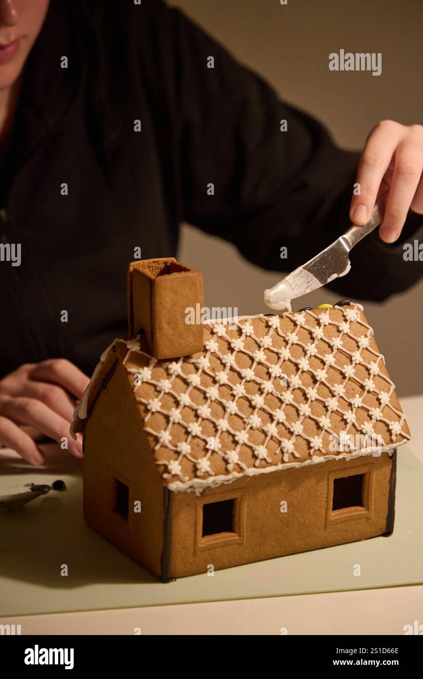 Girl decorating ginger bread hi-res stock photography and images - Alamy