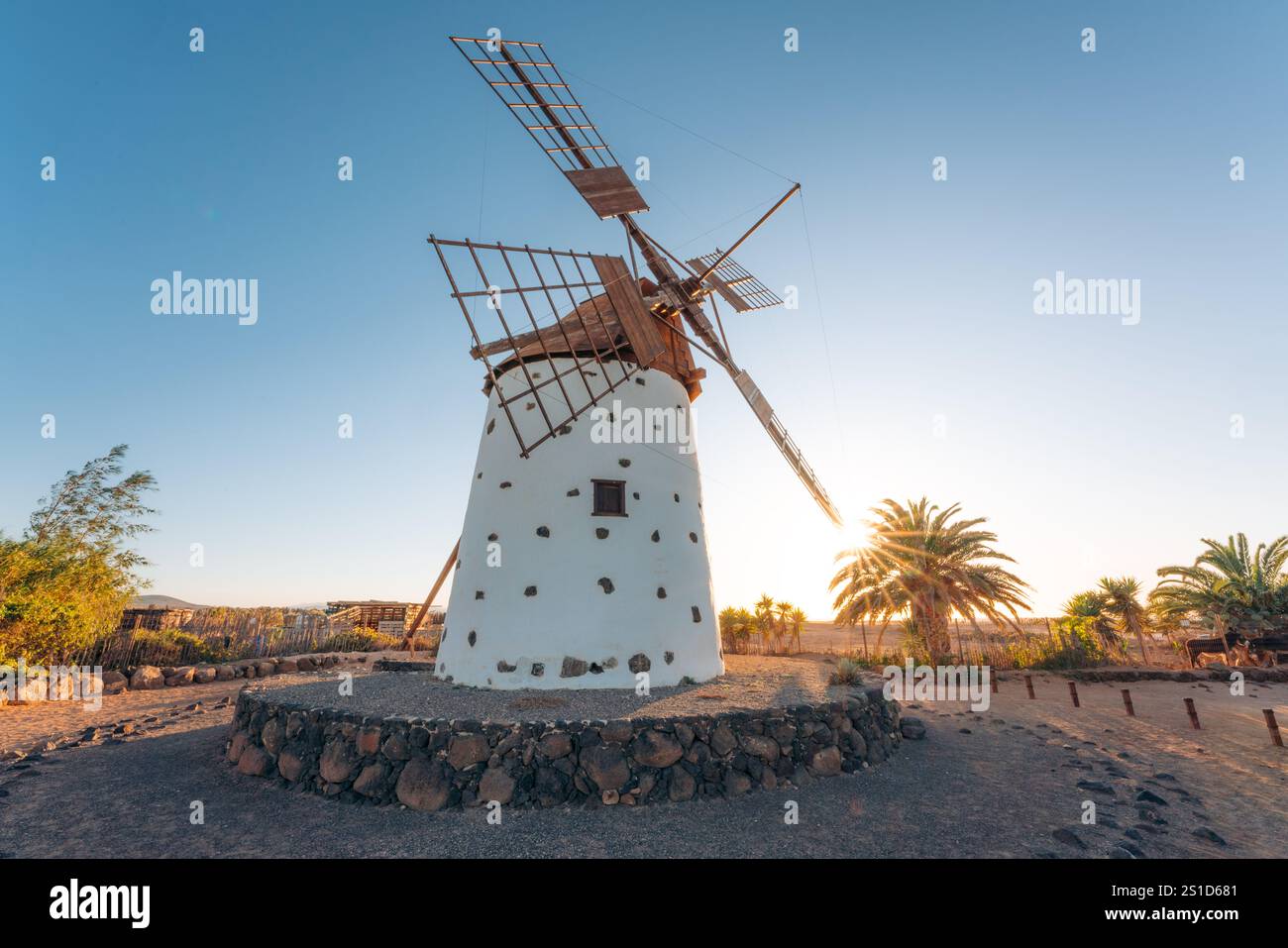 One beautiful spanish isolated ancient white traditional stone windmill ...