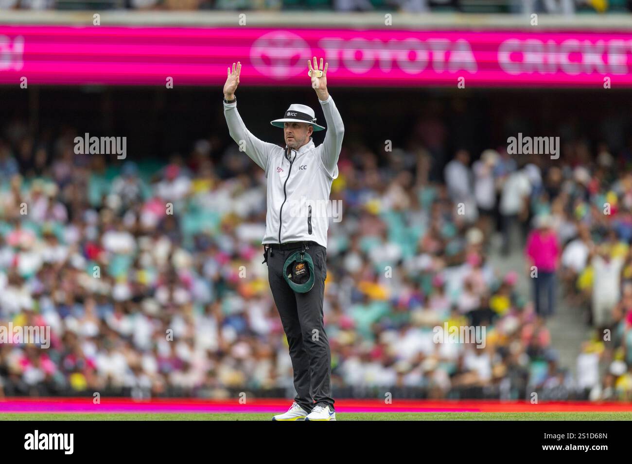 SYDNEY, AUSTRALIA - JANUARY 03: On-field umpire Michael Gough signals a ...