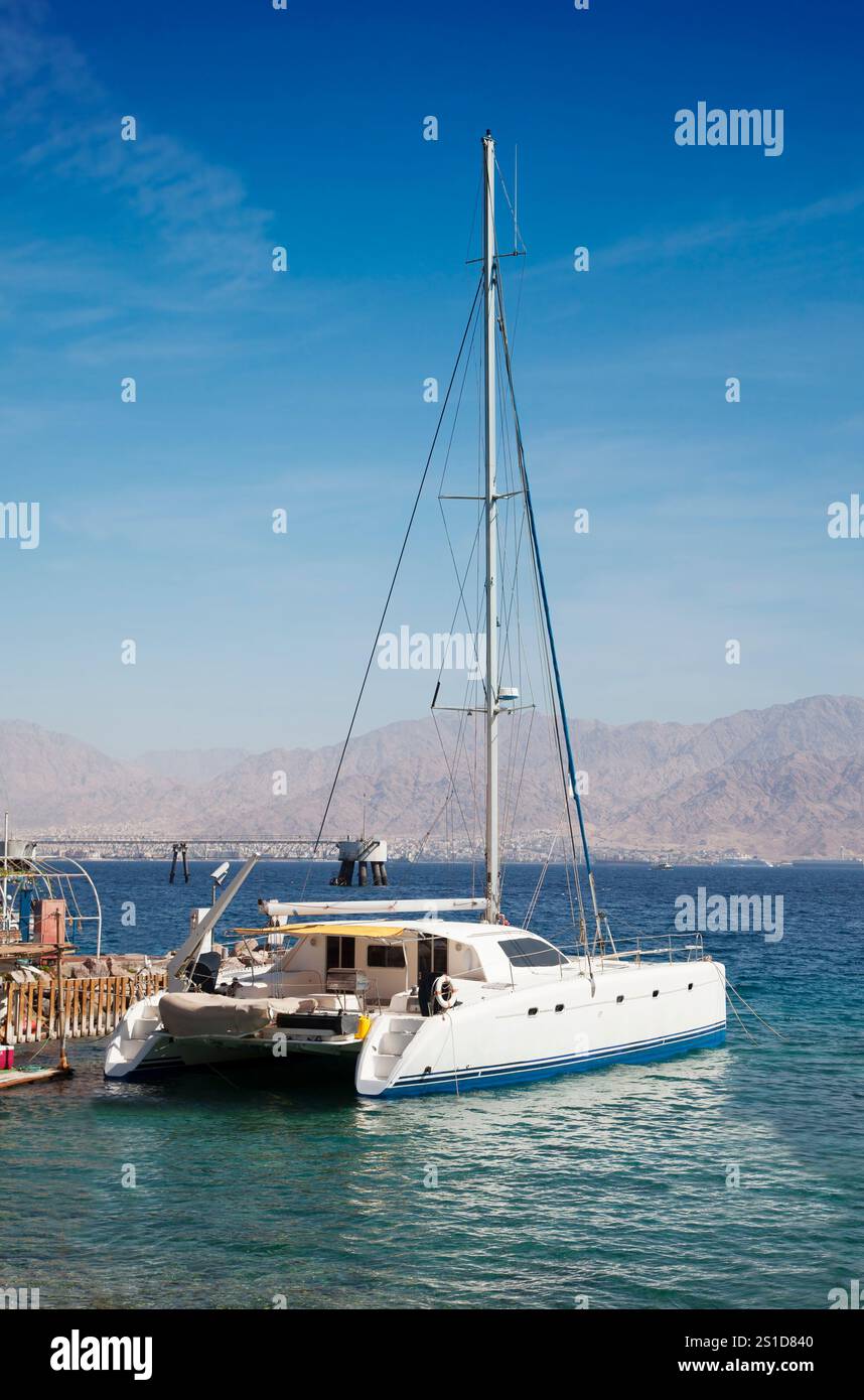 Sailboat (catamaran) in a marina in Eilat, Israel Stock Photo - Alamy