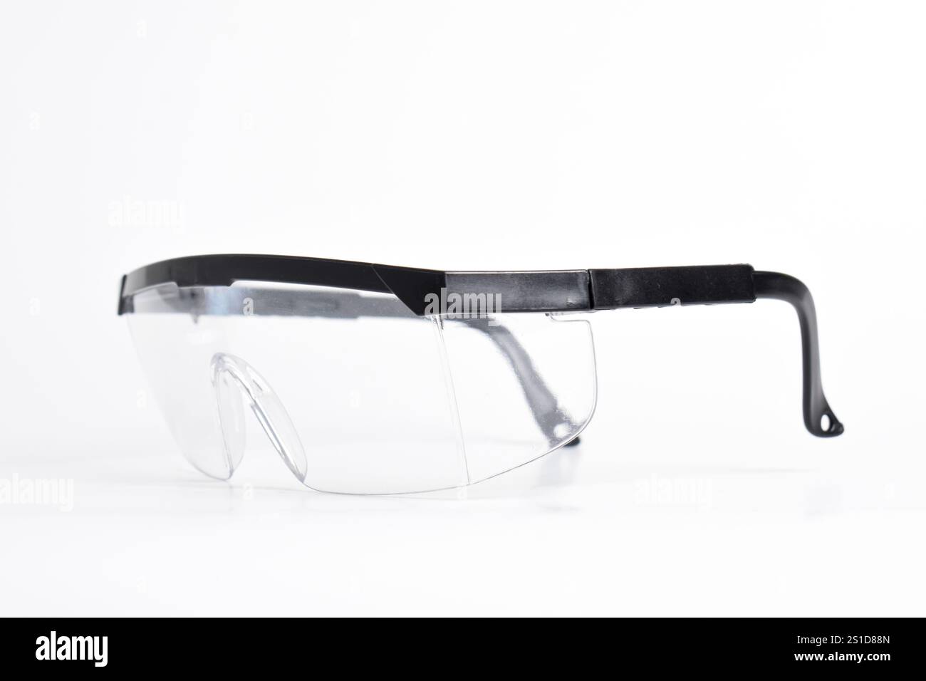 Clear plastic safety goggles isolated on white background Stock Photo ...
