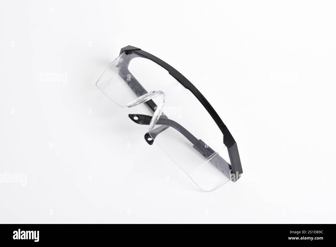 Clear plastic safety goggles isolated on white background Stock Photo ...