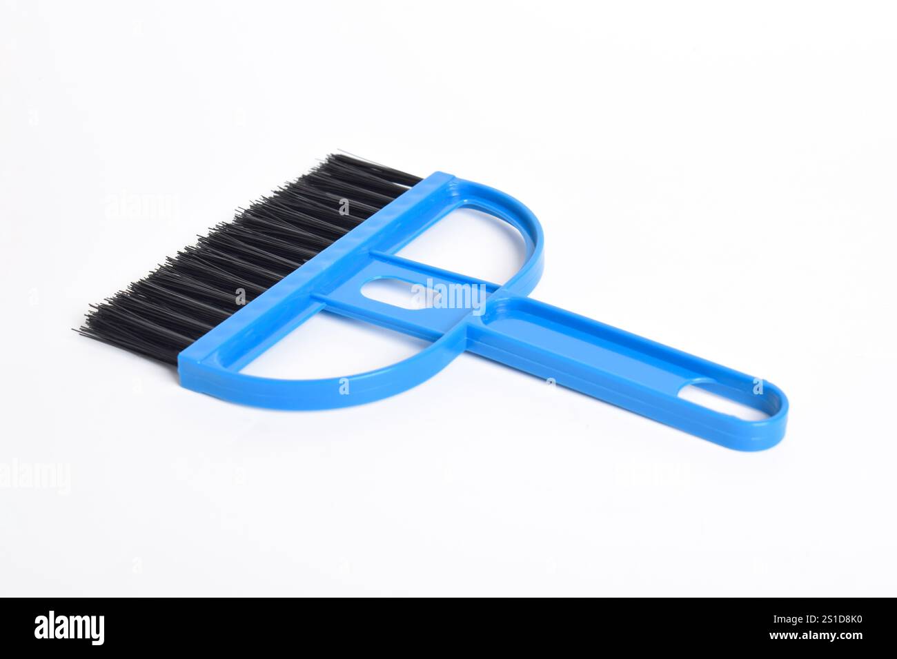 Small blue broom isolated on white background Stock Photo - Alamy