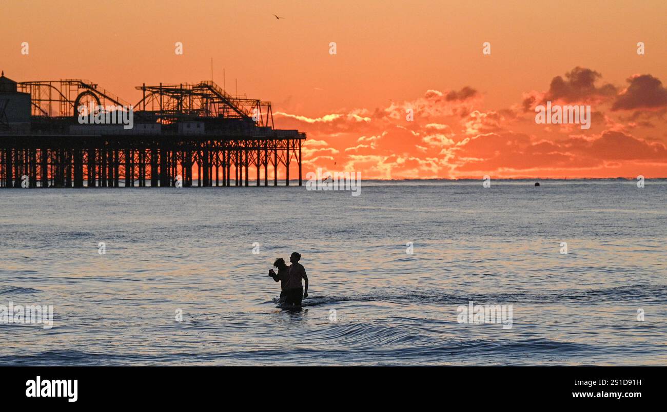 Brighton UK 3rd January 2025 - Sea swimmers brave the freezing cold ...