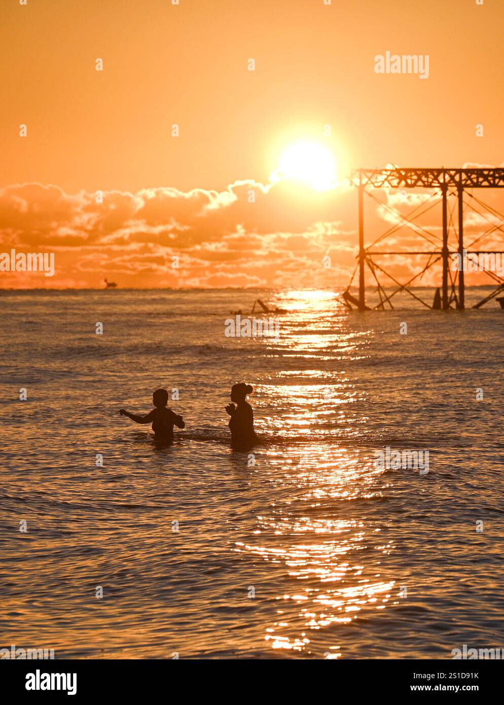Brighton UK 3rd January 2025 - Sea swimmers brave the freezing cold ...