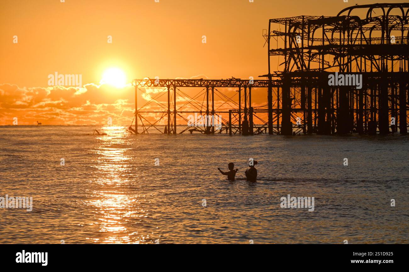 Brighton UK 3rd January 2025 - Sea swimmers brave the freezing cold ...