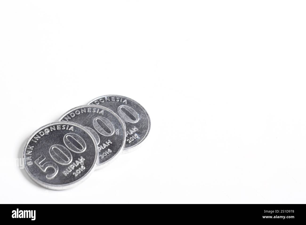 Silver coins isolated on white background. Indonesian rupiah coin ...