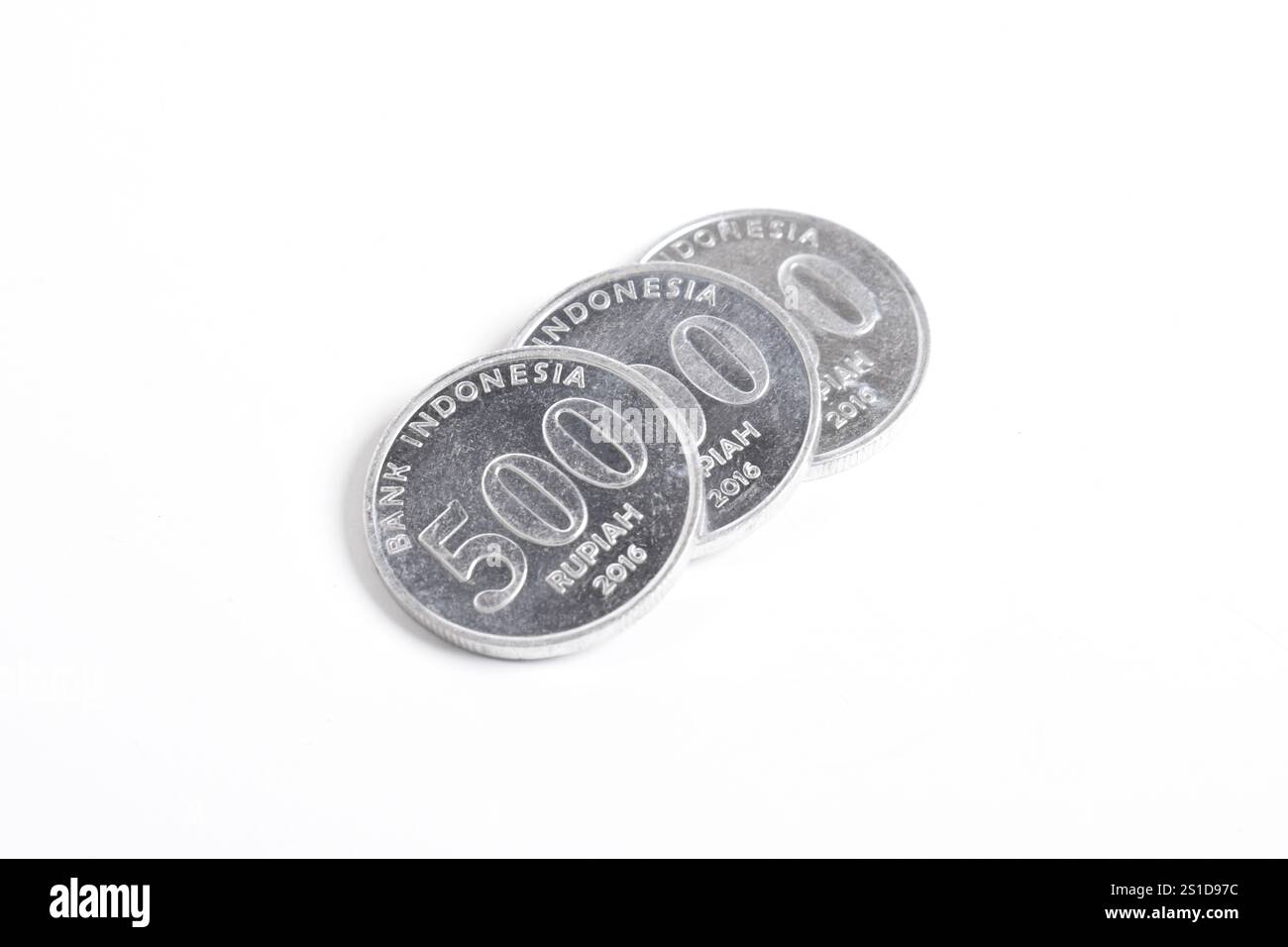 Silver coins isolated on white background. Indonesian rupiah coin ...