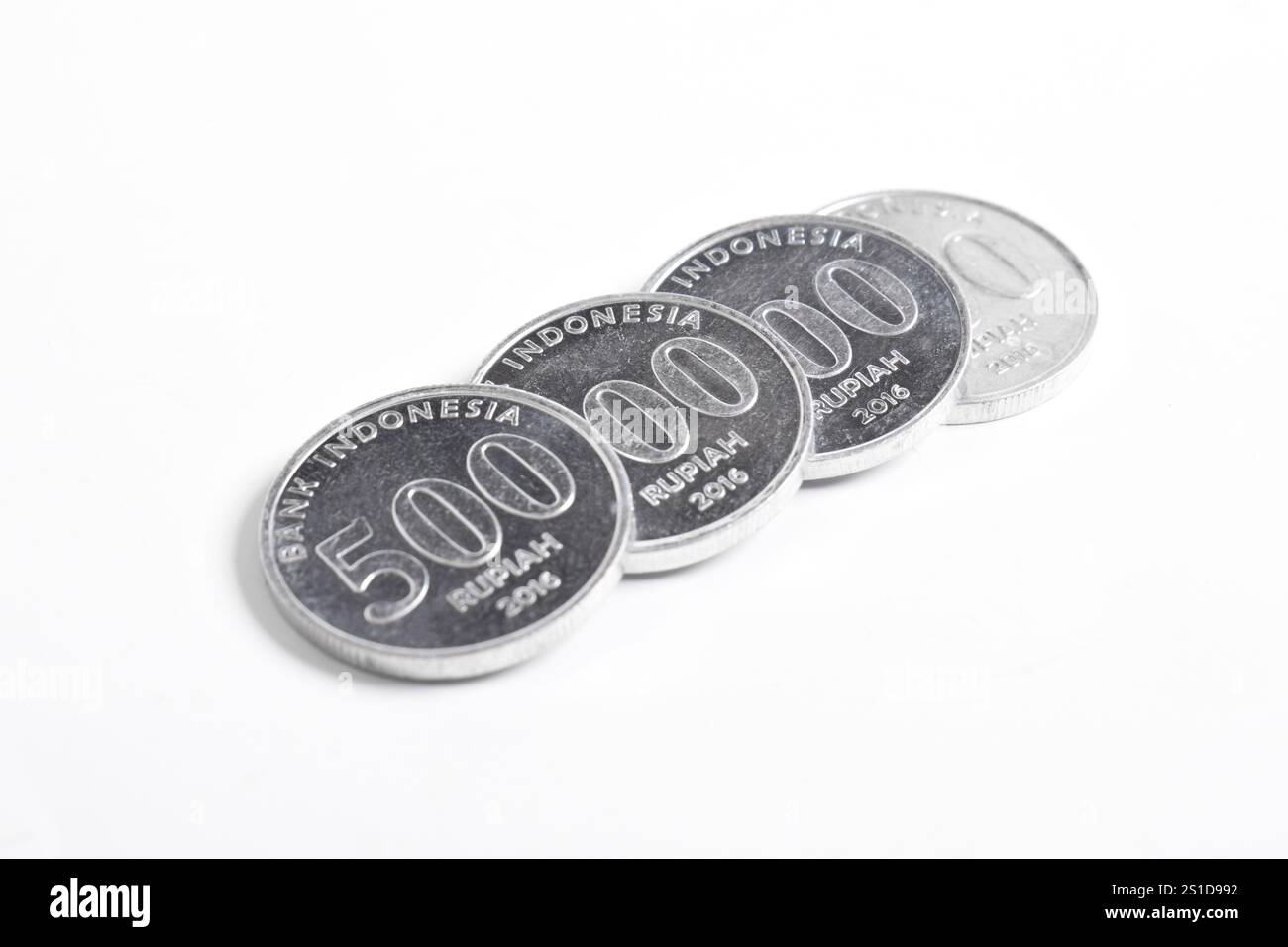 Silver coins isolated on white background. Indonesian rupiah coin ...