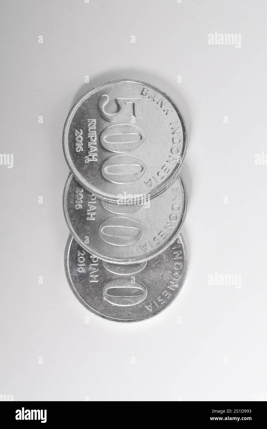 Silver coins isolated on white background. Indonesian rupiah coin ...