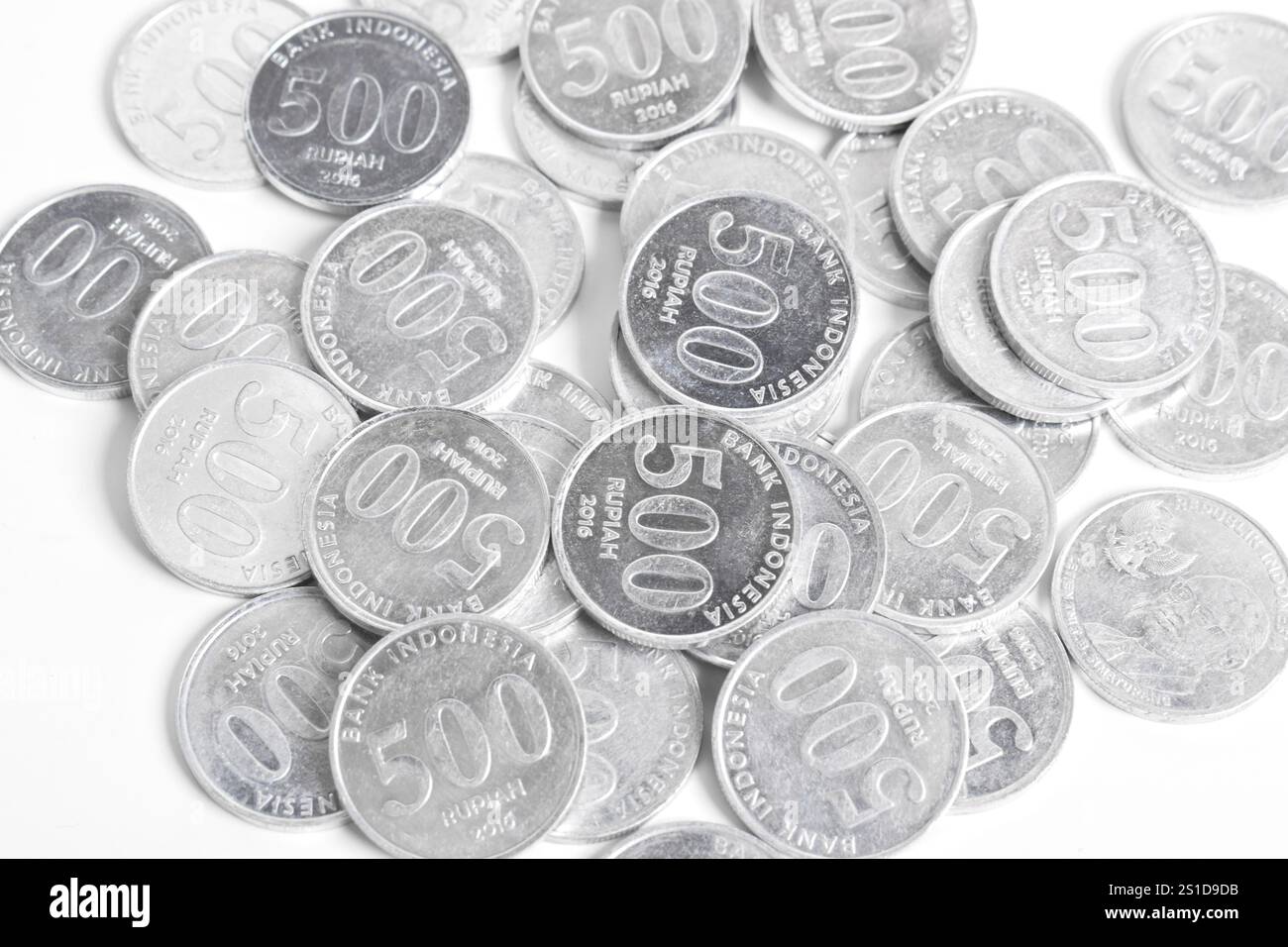Stack of 500 rupiah coins on white background. National currency ...