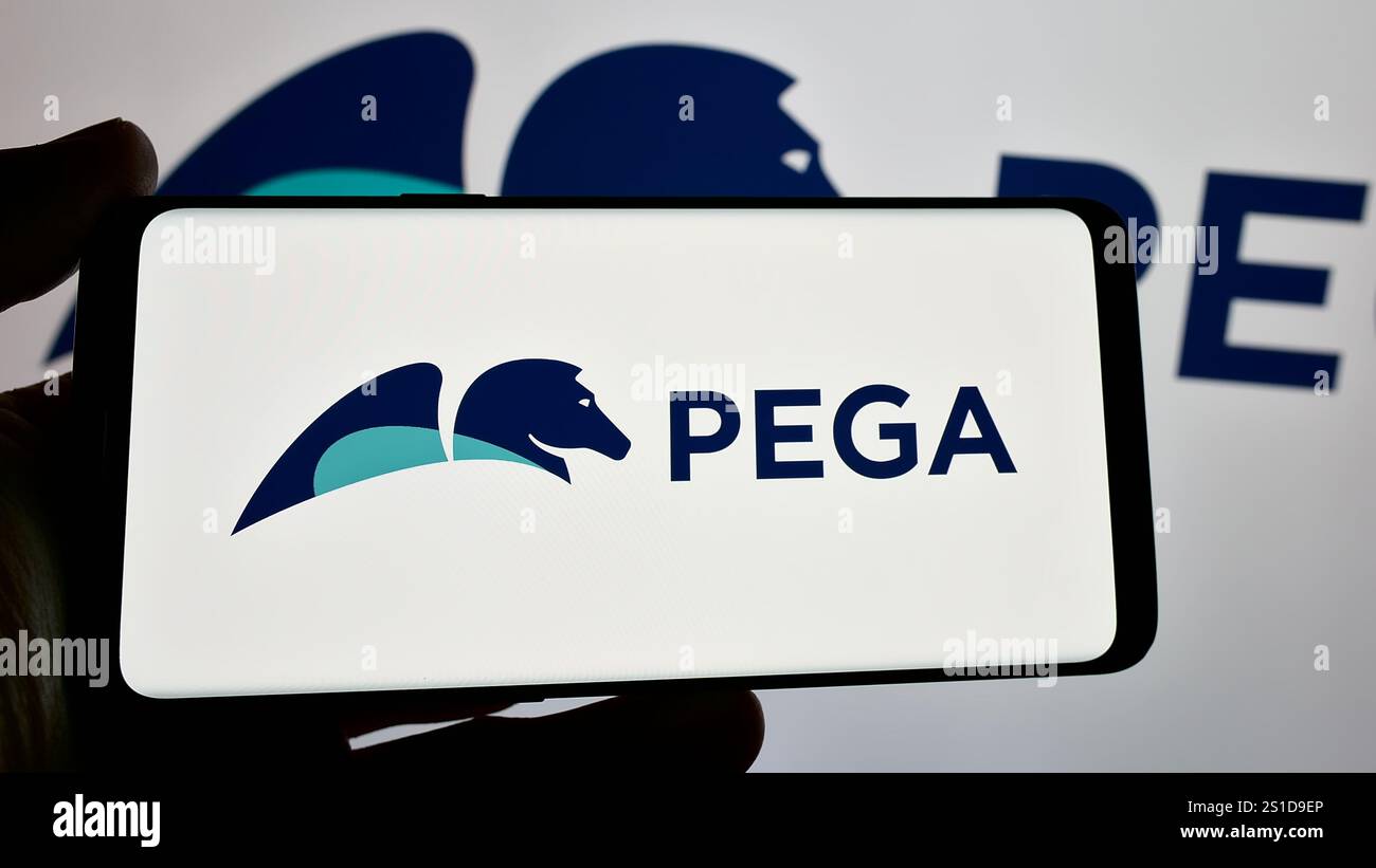 In this photo illustration, a person is holding a smartphone with the ...