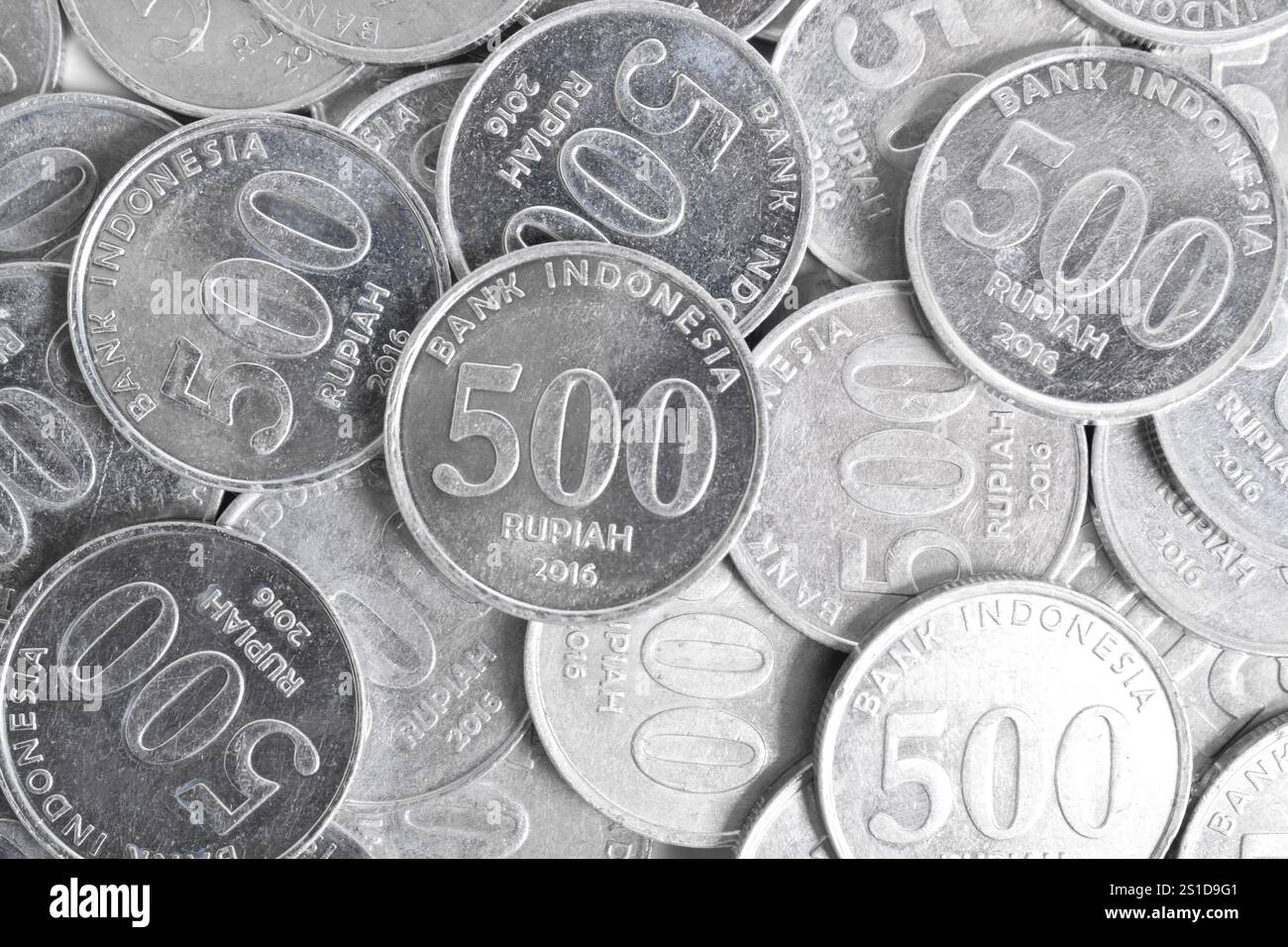 Stack of 500 rupiah coins on white background. National currency ...