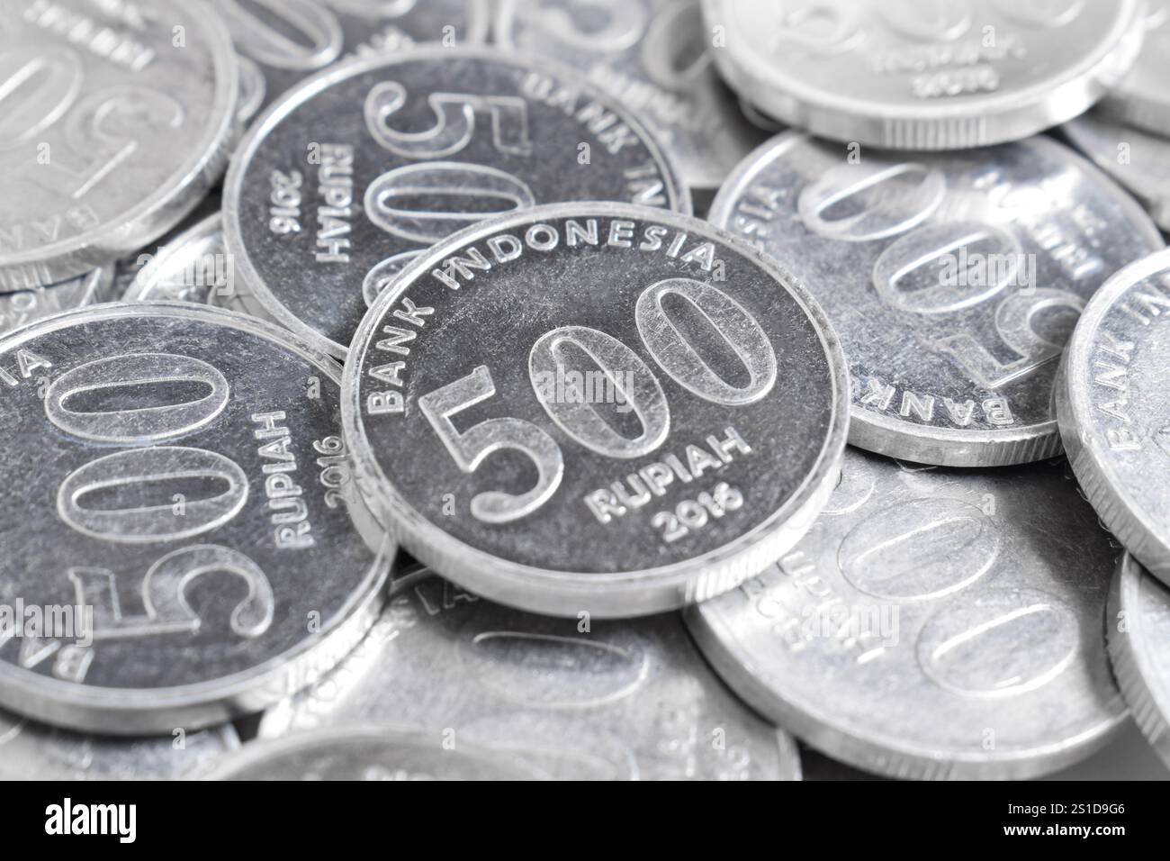 Stack of 500 rupiah coins on white background. National currency ...