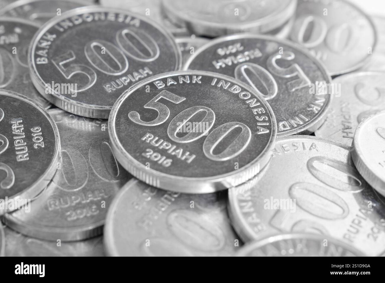 Stack of 500 rupiah coins on white background. National currency ...