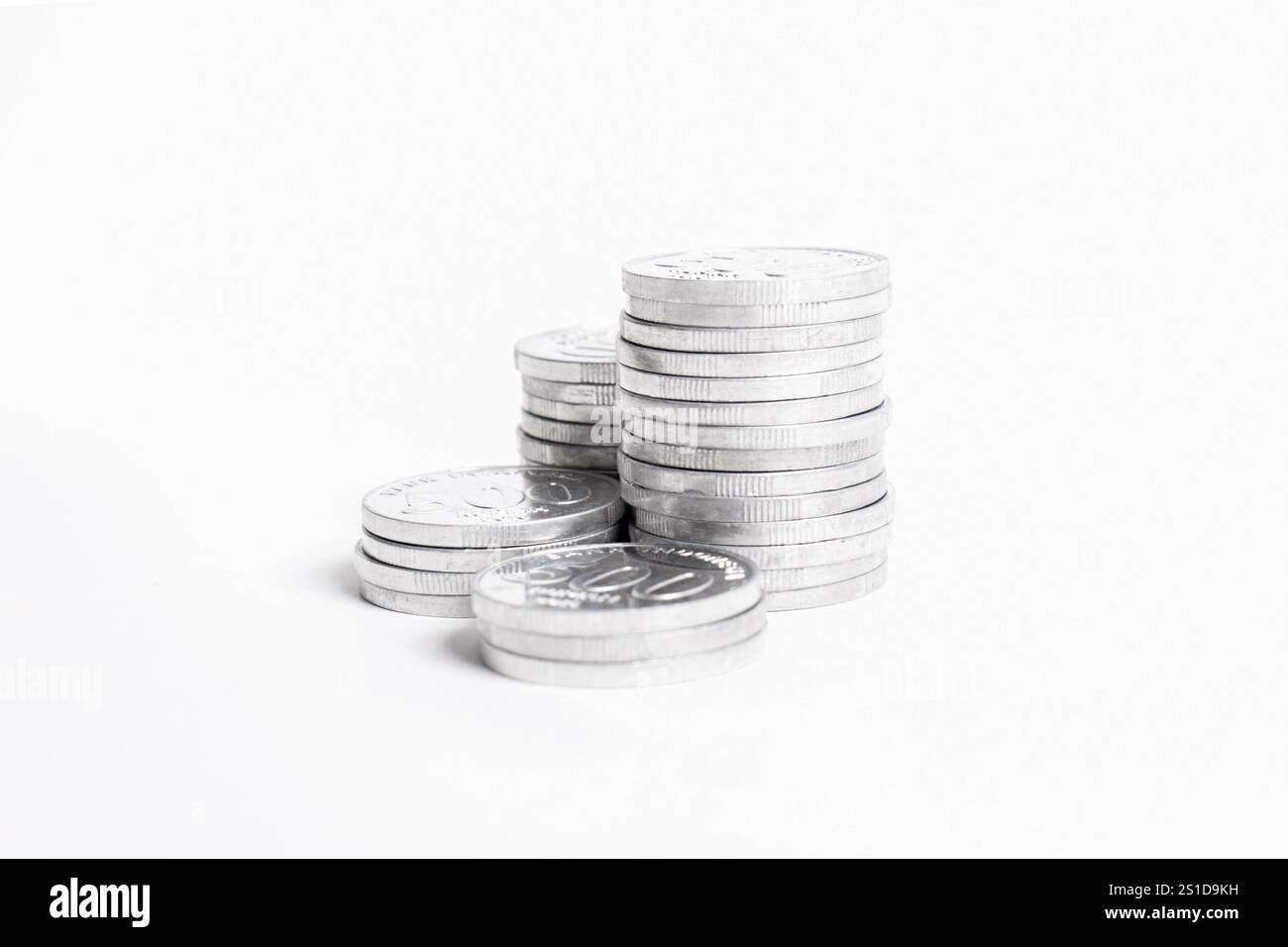 Coins stacks isolated on a white background. Silver coin money. Piles ...