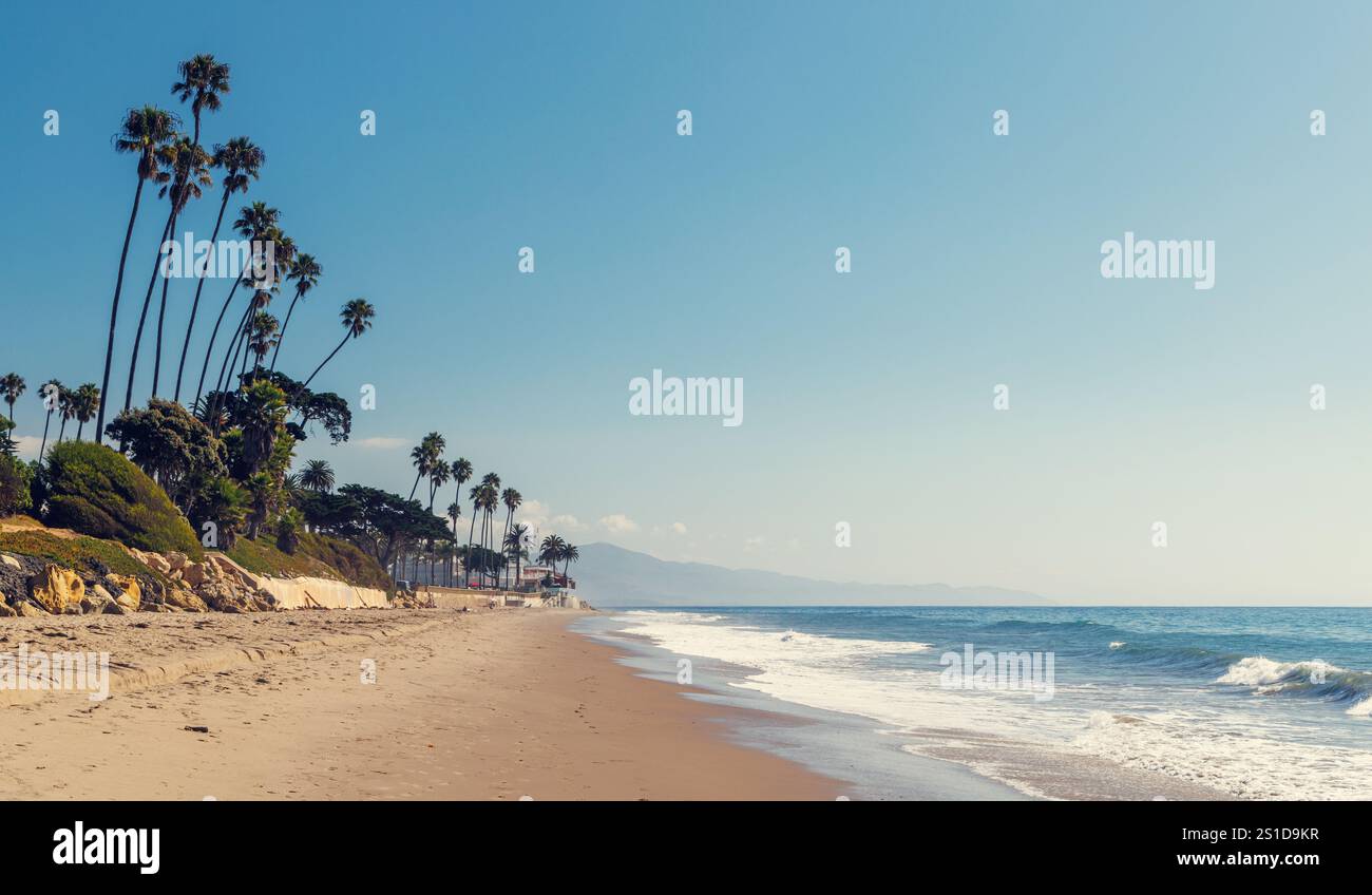 A breathtaking view of the California coast featuring golden sandy ...