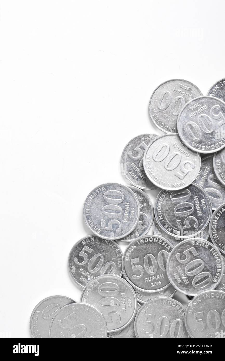 Stack of 500 rupiah coins on white background. National currency ...