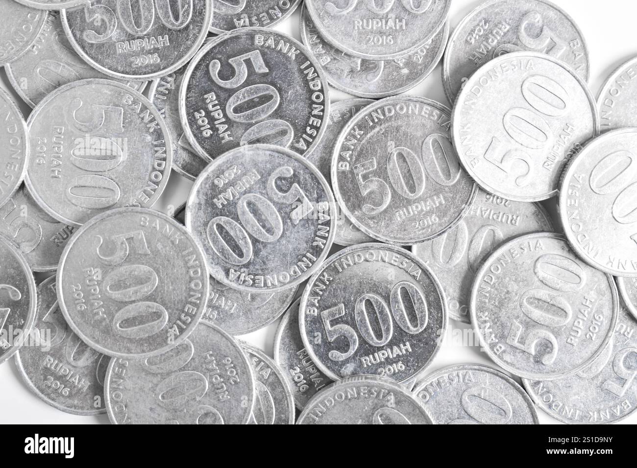 Stack of 500 rupiah coins on white background. National currency ...