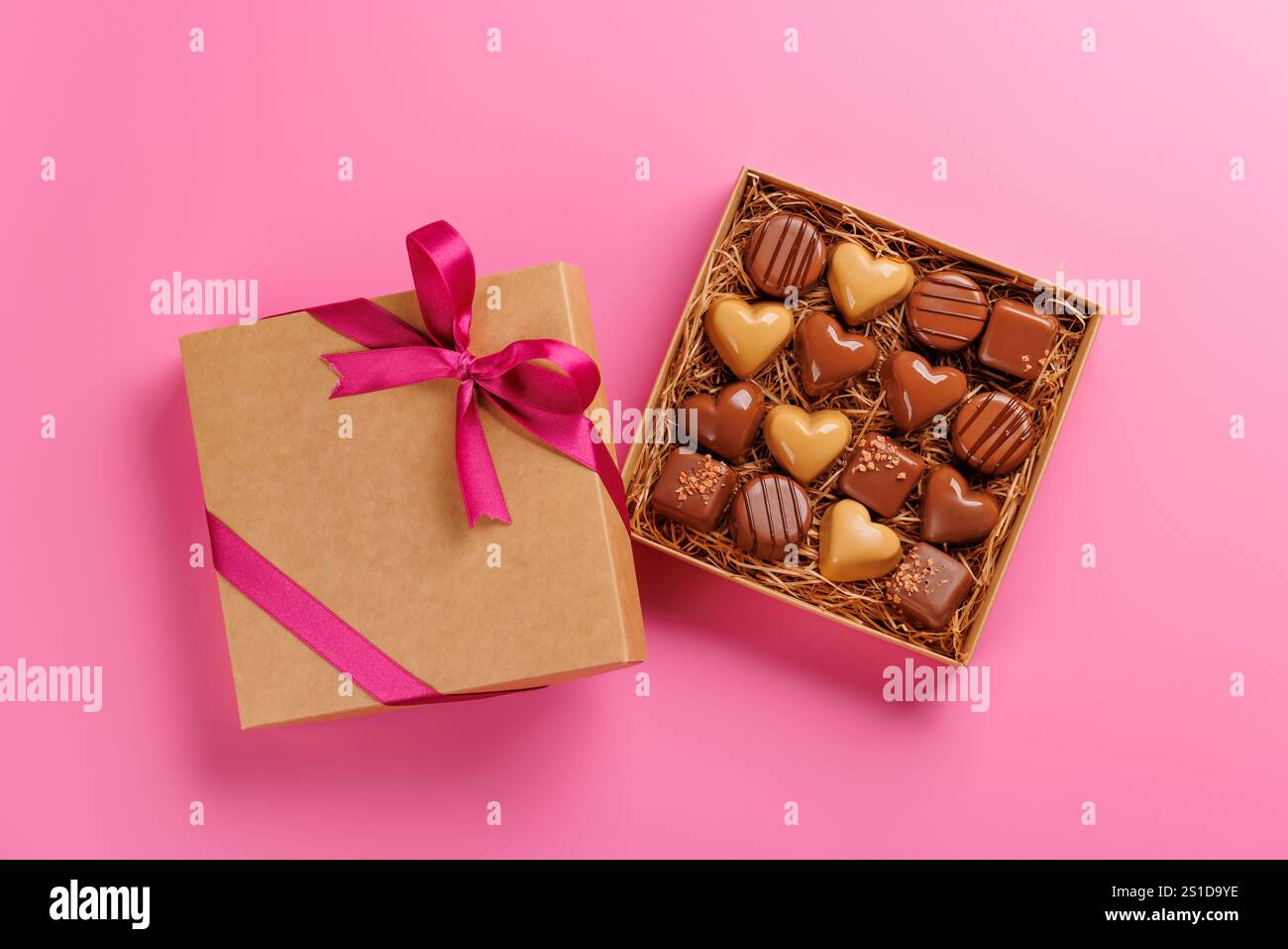 Valentines day box of rich chocolates, set against a romantic backdrop ...