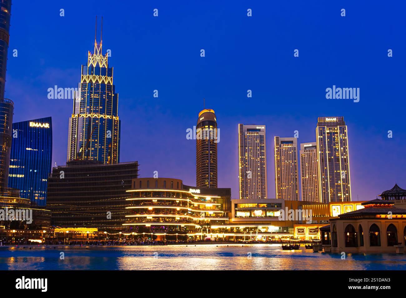 Panoramic skyline and modern commercial buildings with empty lagoon ...