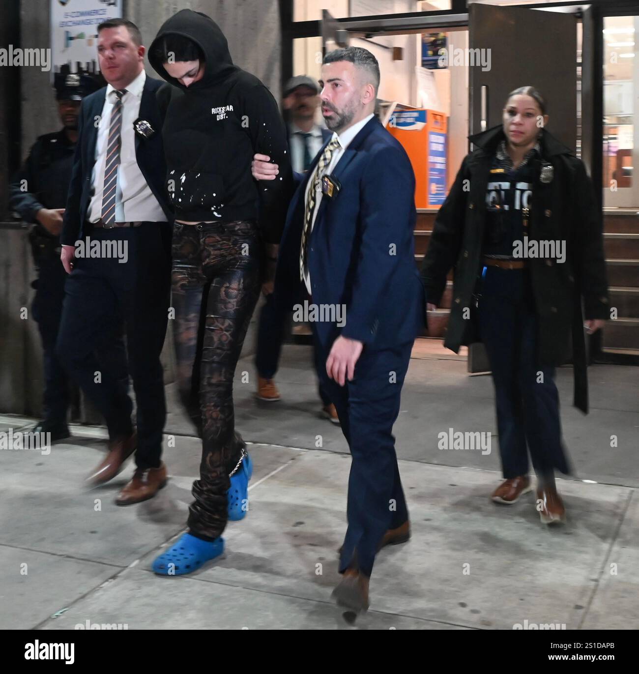 Jaia Cruz, a 24 year old female was arrested. She was in handcuffs and ...