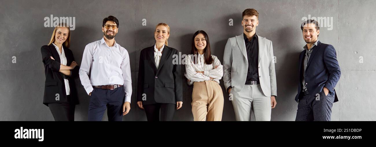 Group of Professionals Posing Together in Modern Office Setting During ...