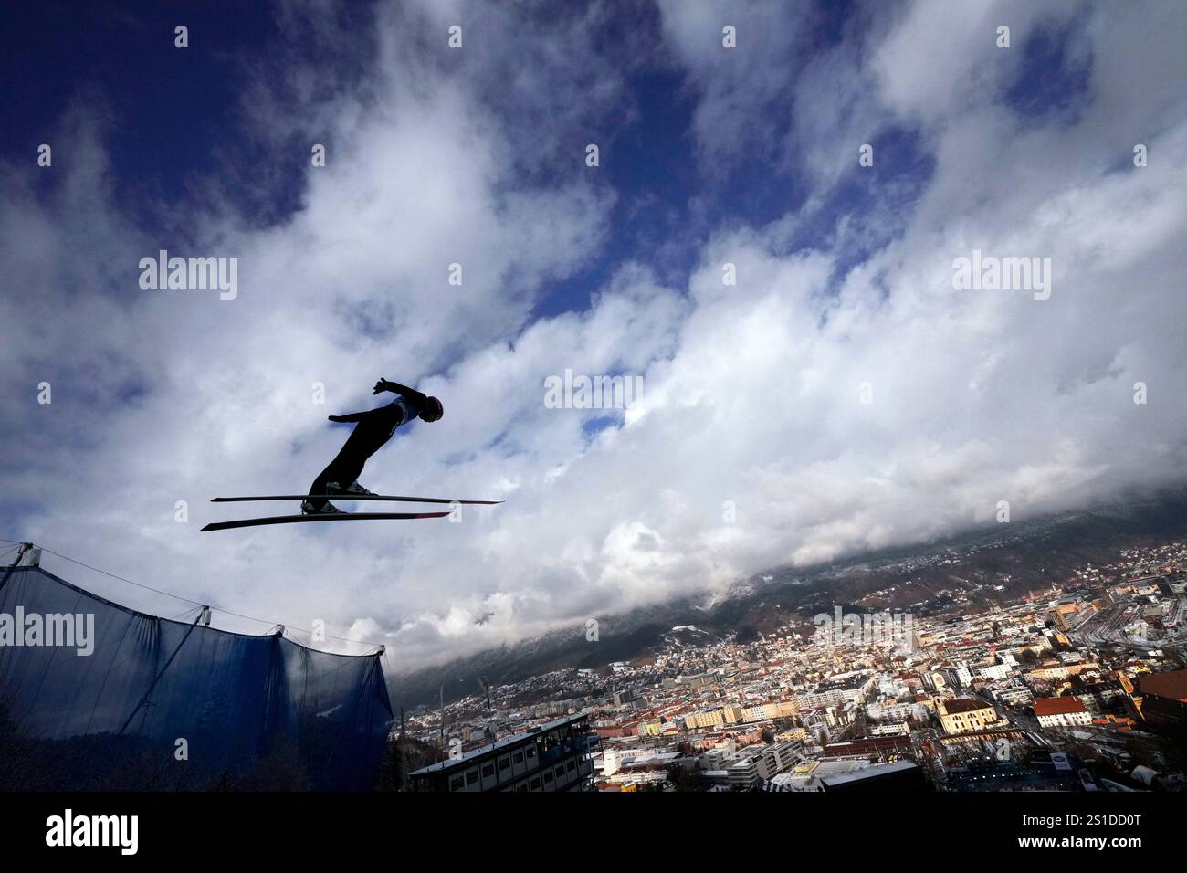 Casey Larson, of the United States, soars through the air during ...