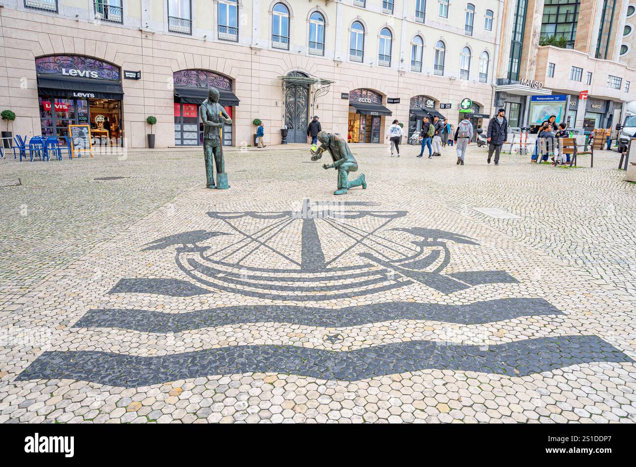 Two metal statues in honor of the pavers who build the ground we walk ...