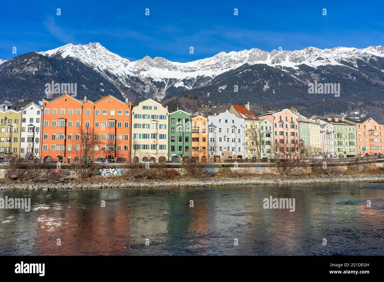 Innsbruck in Austria Tyrol with traditional buildings and Alpine peaks ...