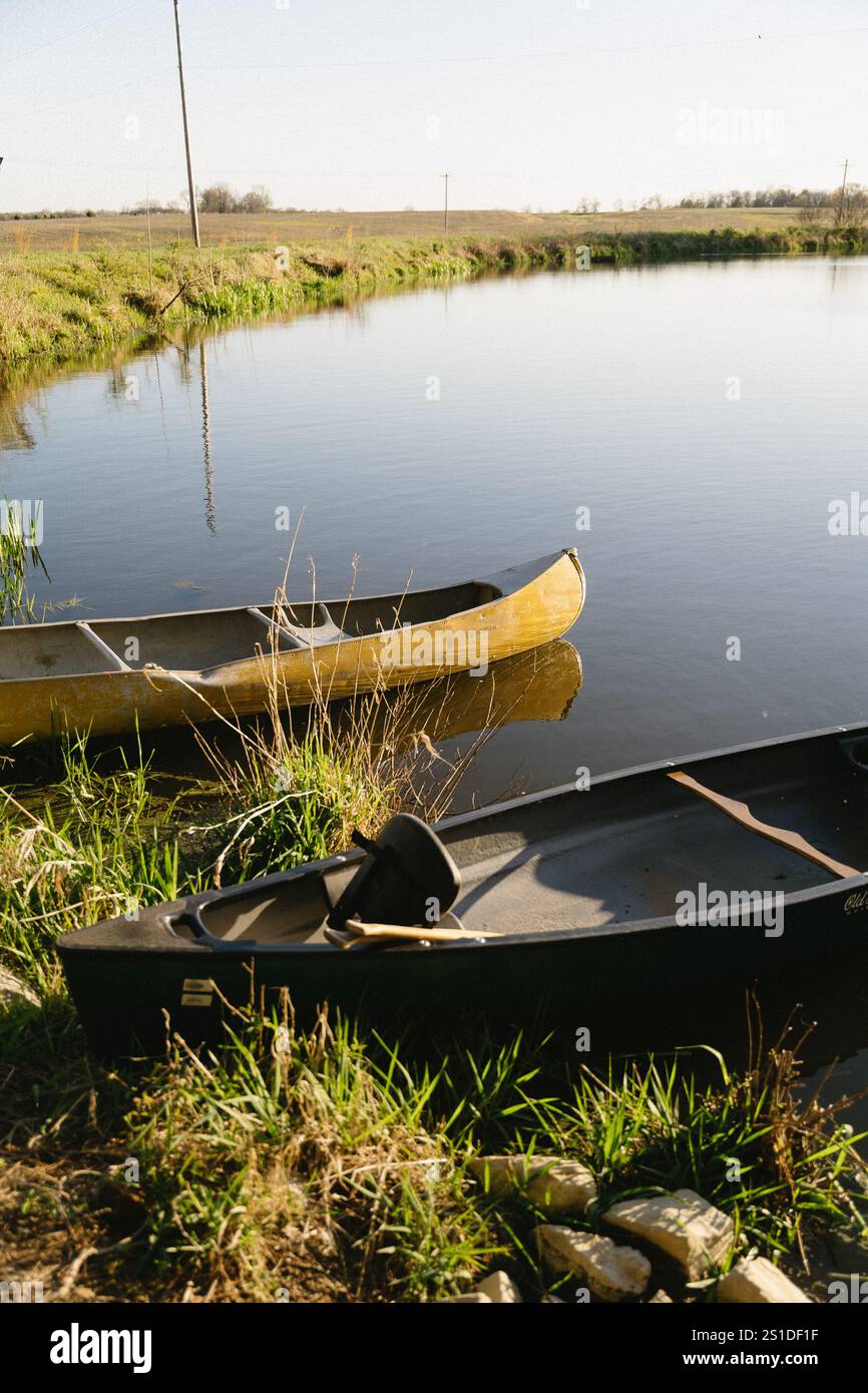 two canoes on a pond Stock Photo - Alamy