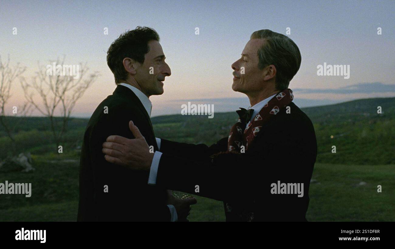 GUY PEARCE and ADRIEN BRODY in THE BRUTALIST (2024), directed by BRADY CORBET. Credit ...