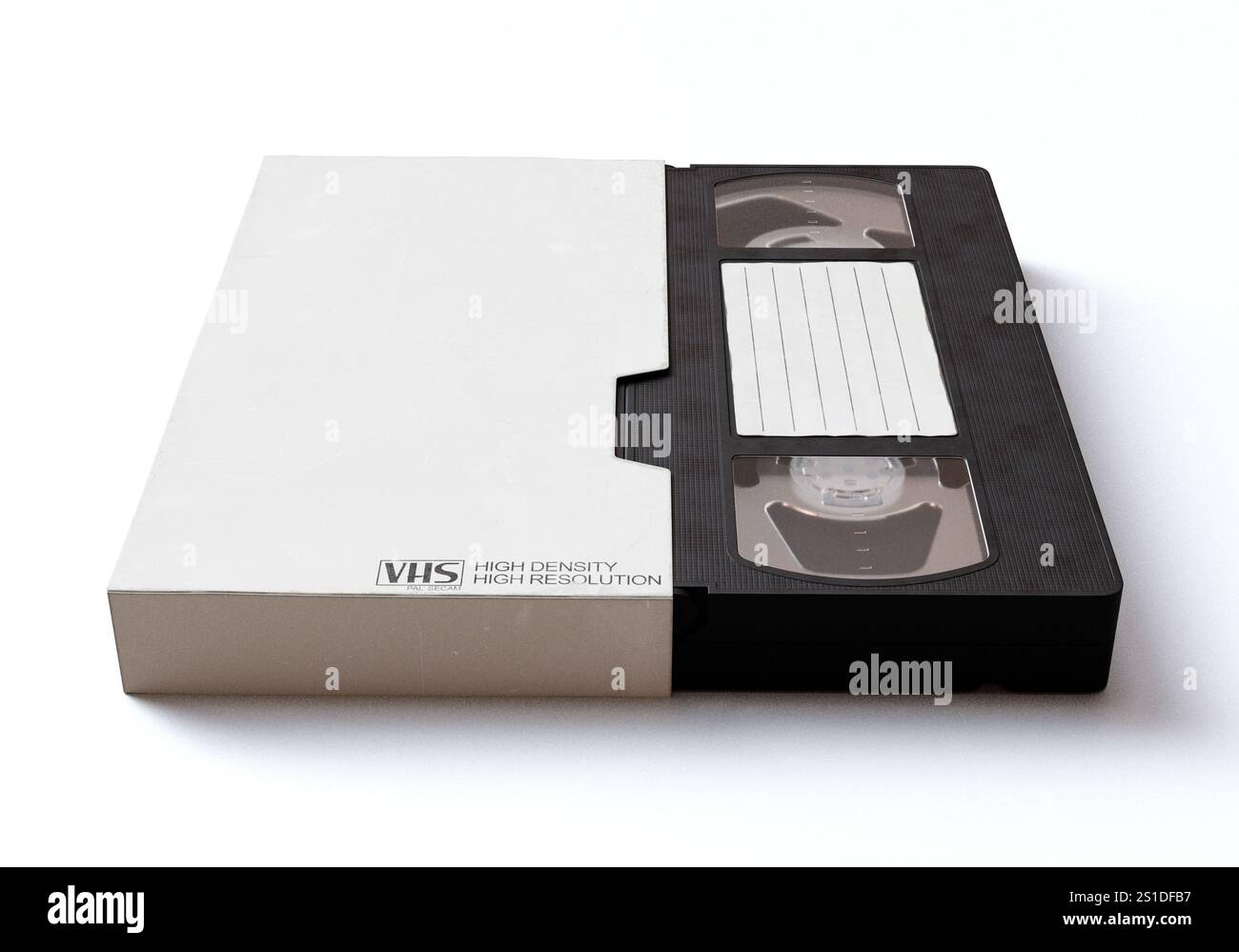 A closeup of a black video cassette analog tape VHS cassette and a ...