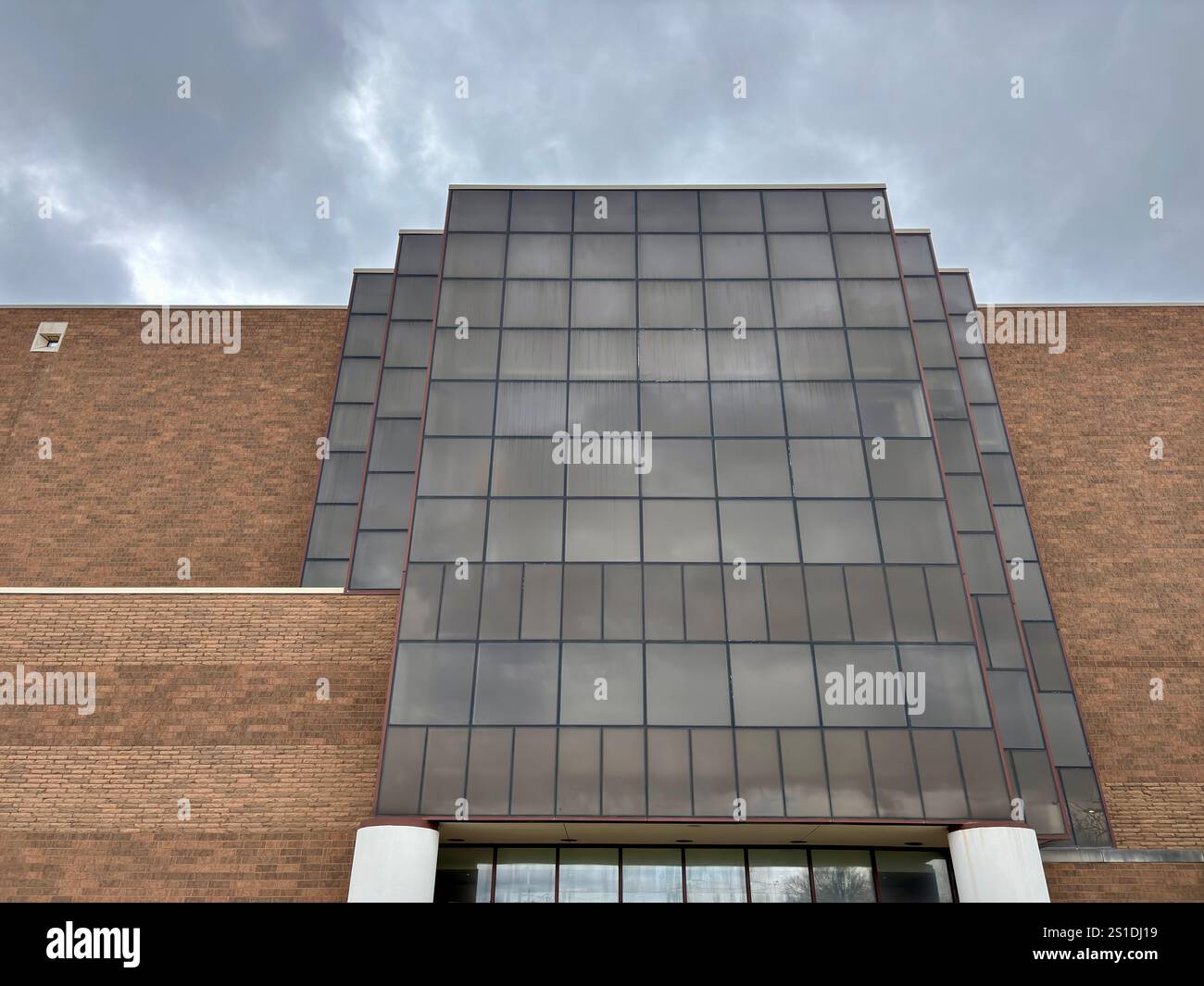 Brick and glass exterior of department store at shopping mall Stock ...