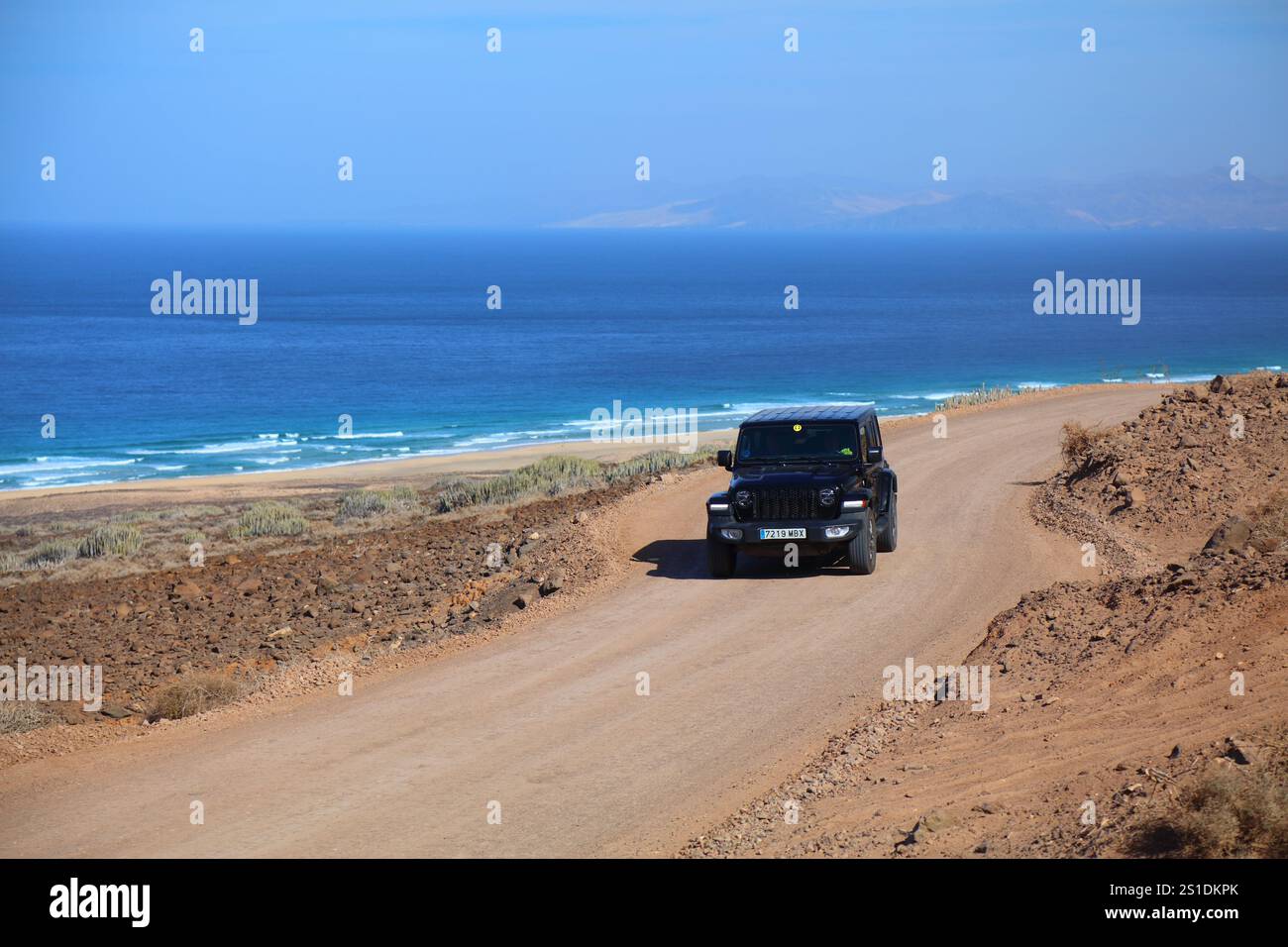 FUERTEVENTURA, SPAIN - DECEMBER 7, 2024: Jeep Wrangler 4x4 car drives ...